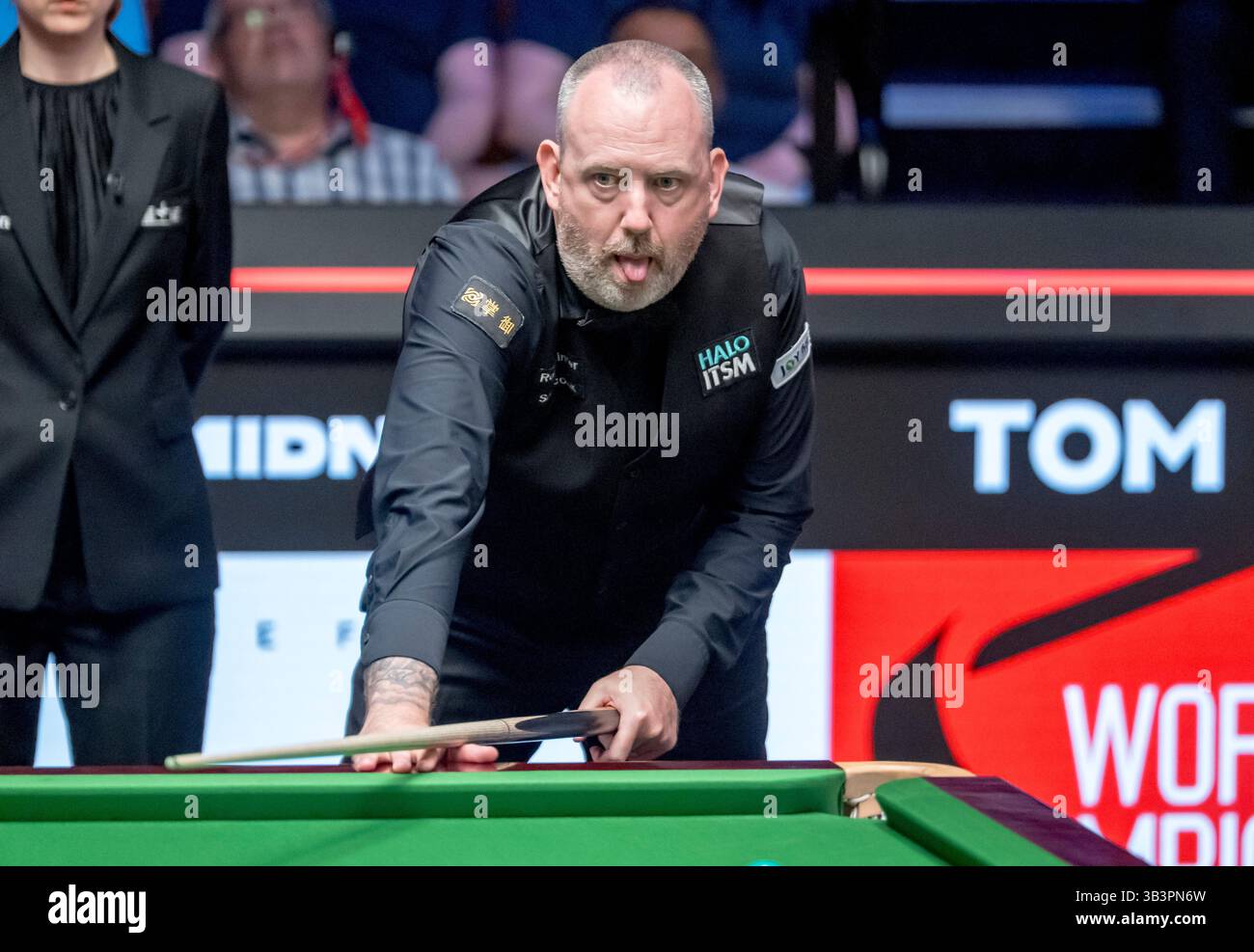 Mark Williams during his match against John Higgins, on day eleven of the Halo World Snooker ...