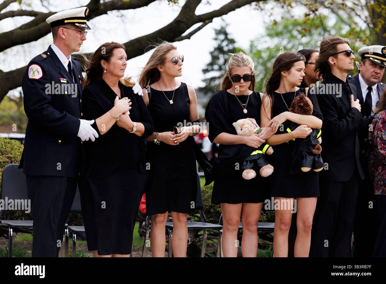 From left to right; Battalion Chief Scott Shawaluk, Kristen Meyer, wife ...