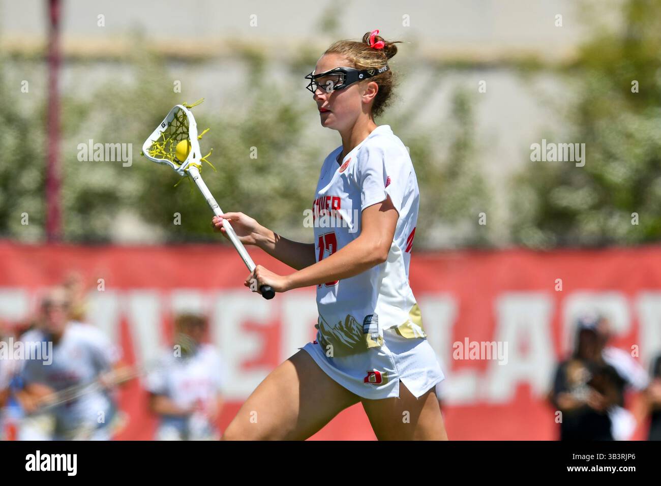 Denver, CO, USA. 26th Apr, 2025. Denver midfielder, Maggie Myers (13 ...