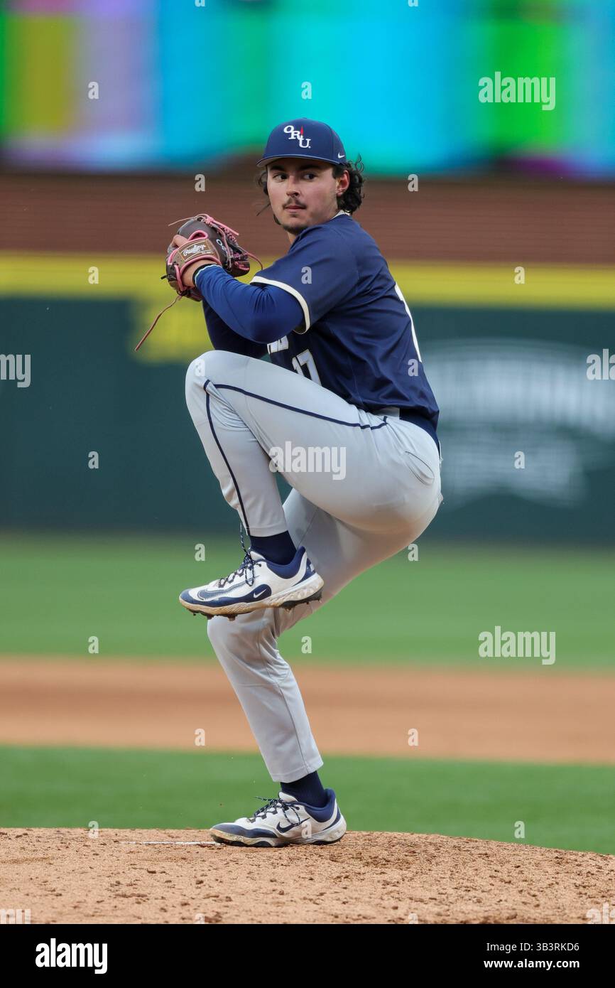 March 19, 2025: ORU pitcher Hudson Hart (17) begins his windup on the ...