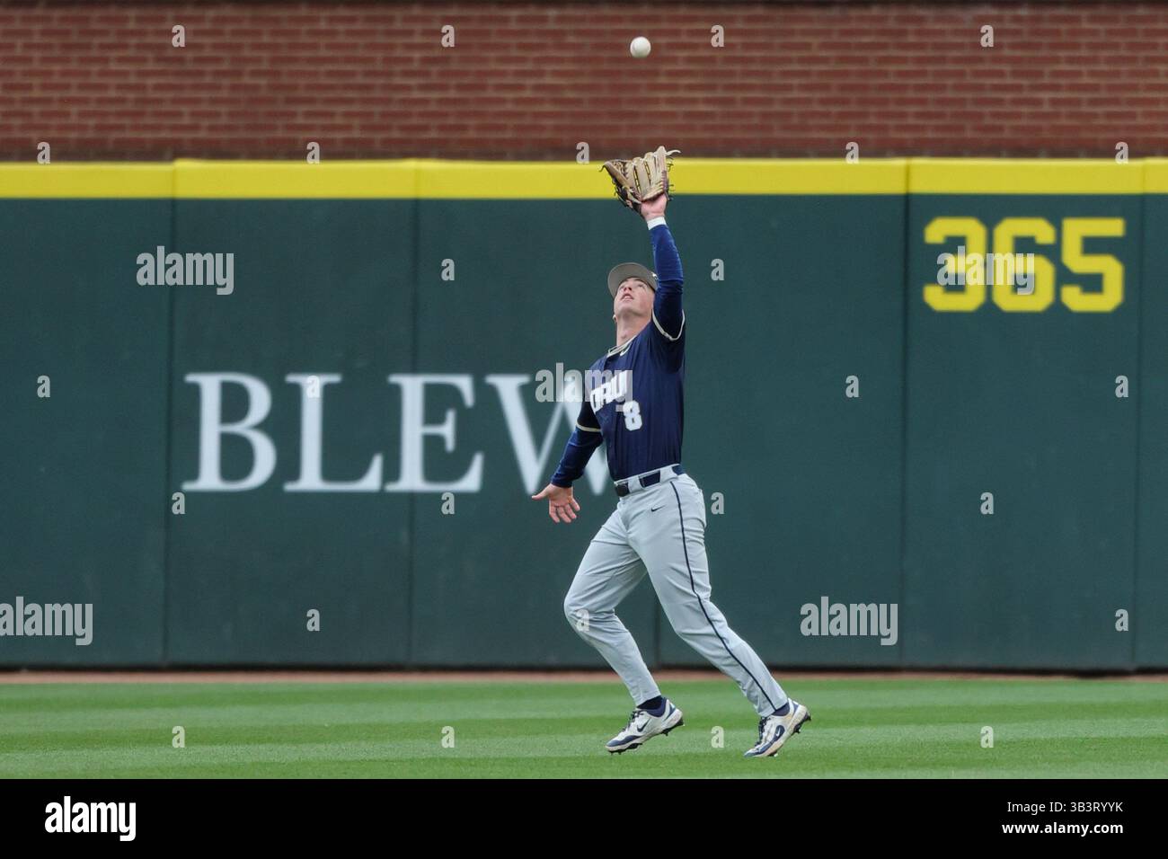 March 19, 2025: ORU outfielder Will Edmunson (8) moves over under a fly ...