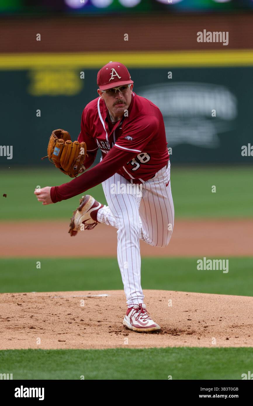 March 19, 2025: Razorback pitcher Colin Fisher (38) follows through on ...