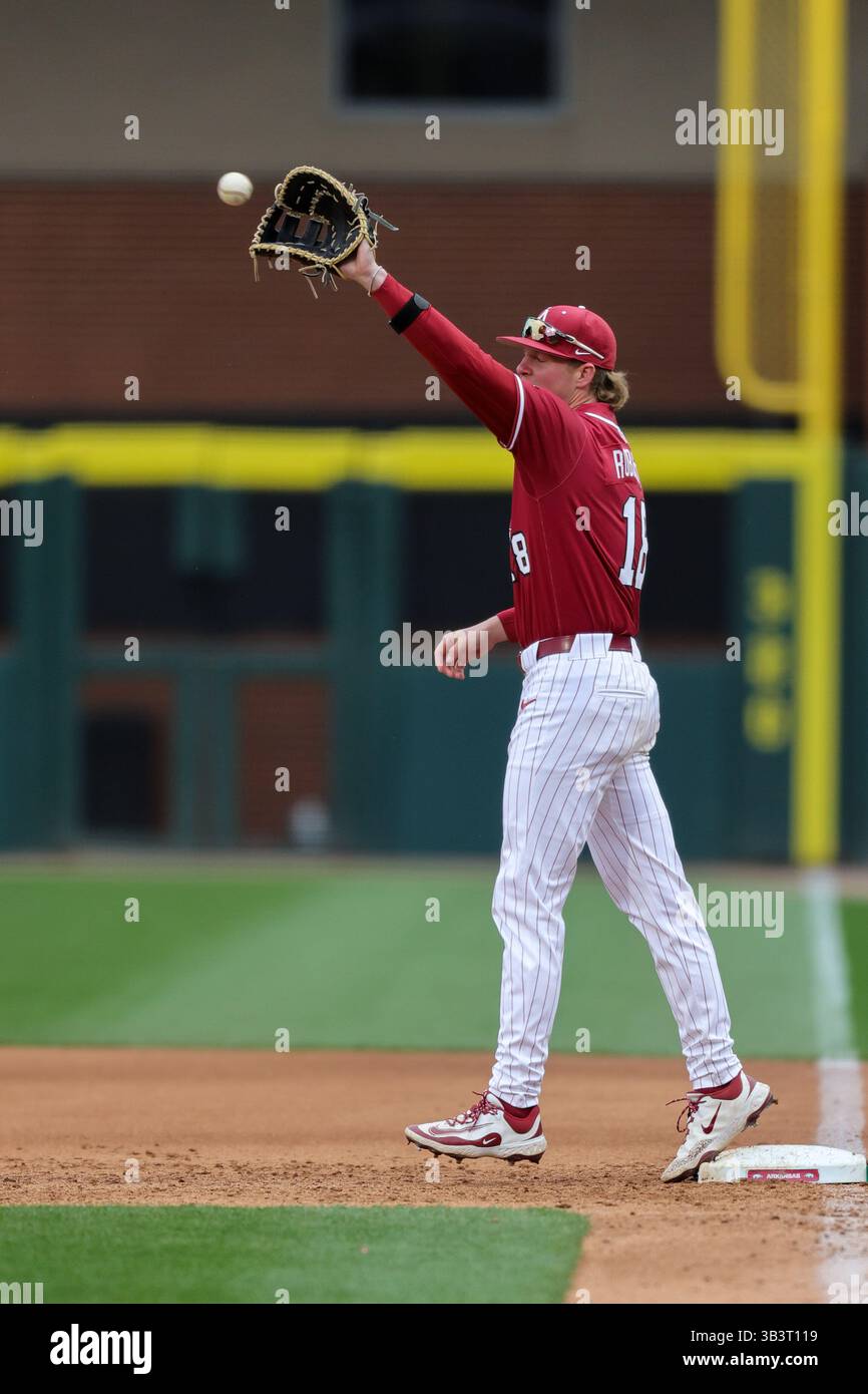 March 19, 2025: Arkansas first baseman Reese Robinett (18) goes up to ...