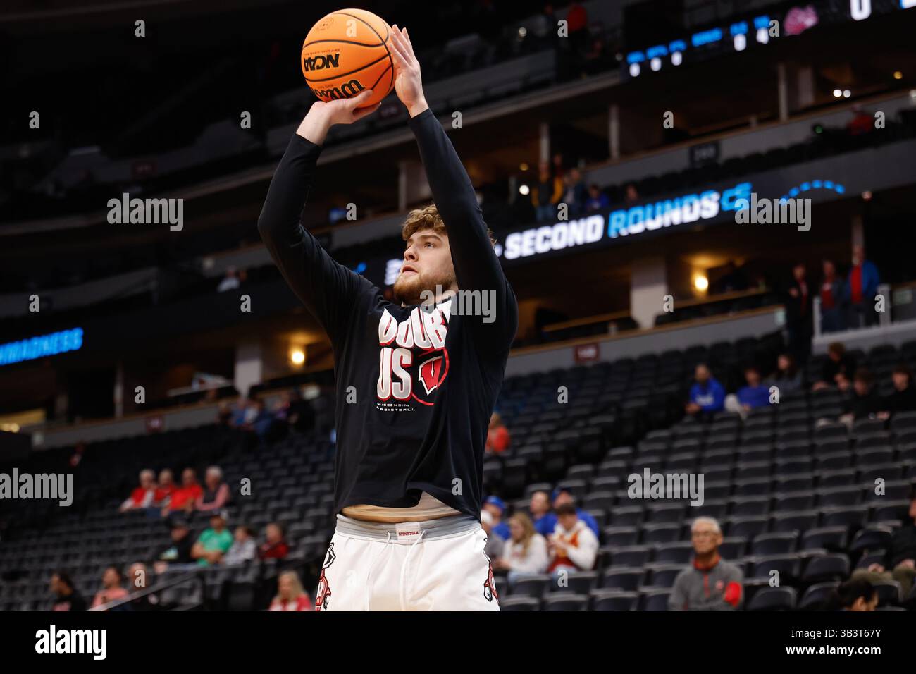 March 20, 2025: Wisconsin Badgers guard Max Klesmit (11) warming up ...