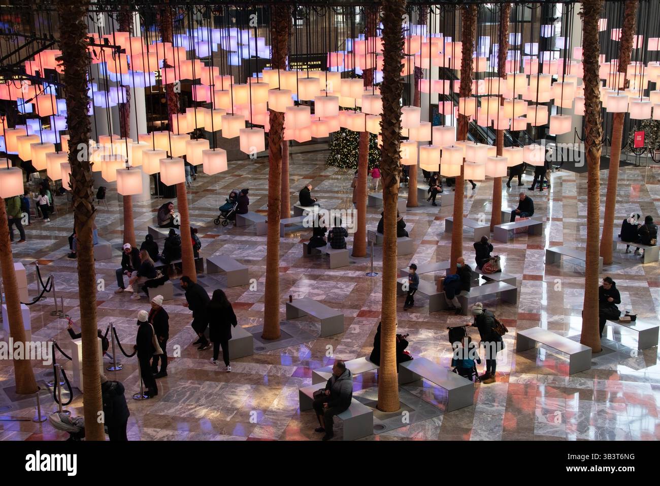 People inside Winter Garden Atrium World Trade Center NYC with palm ...
