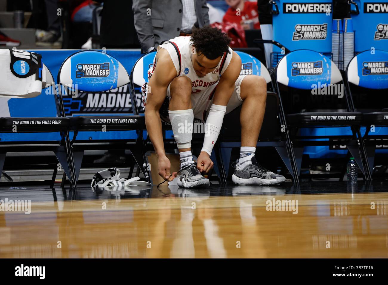Denver, CO, USA. 20th Mar, 2025. Wisconsin Badgers guard John Tonje (9 ...