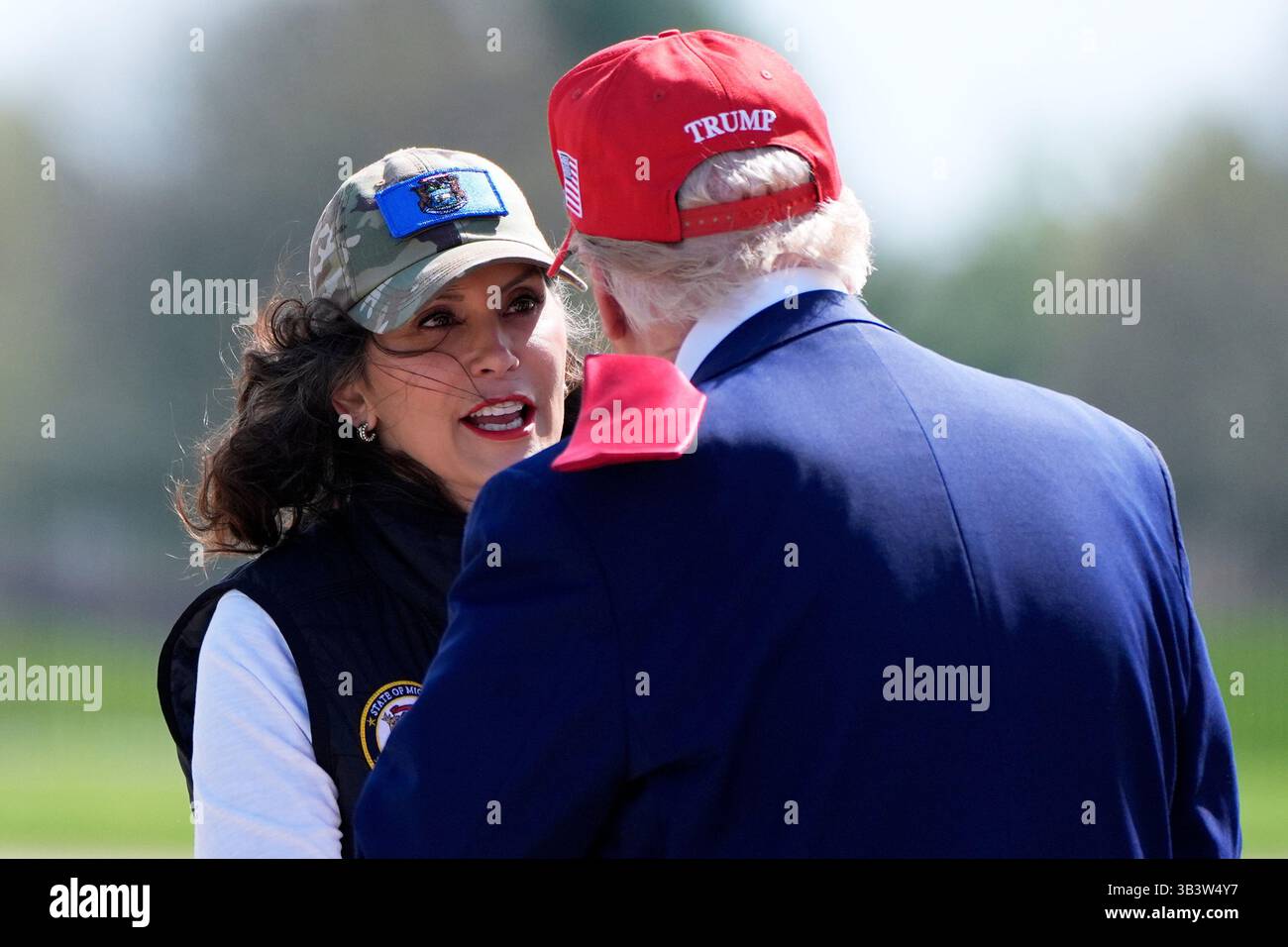 Michigan Gov. Gretchen Whitmer greets President Donald Trump as he ...