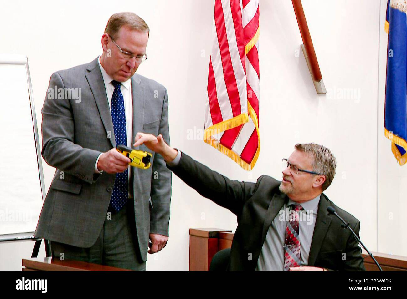 Bryan Chiles, senior manager of Axon Forensics, shows Kent County ...