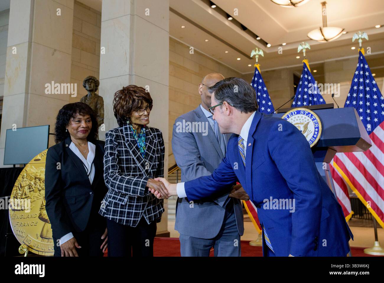 House Speaker Mike Johnson, R-La., right, shakes hands with Judith ...