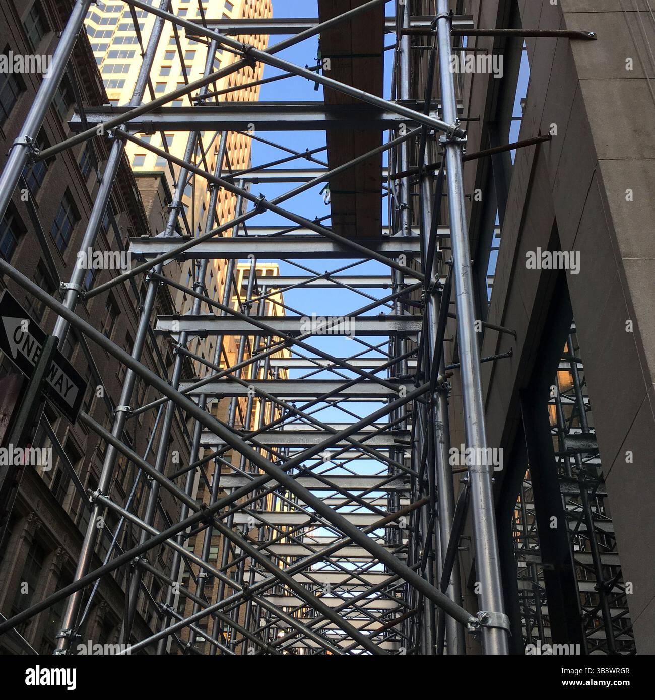 A city block full of movement tells the story of people and places in a ...