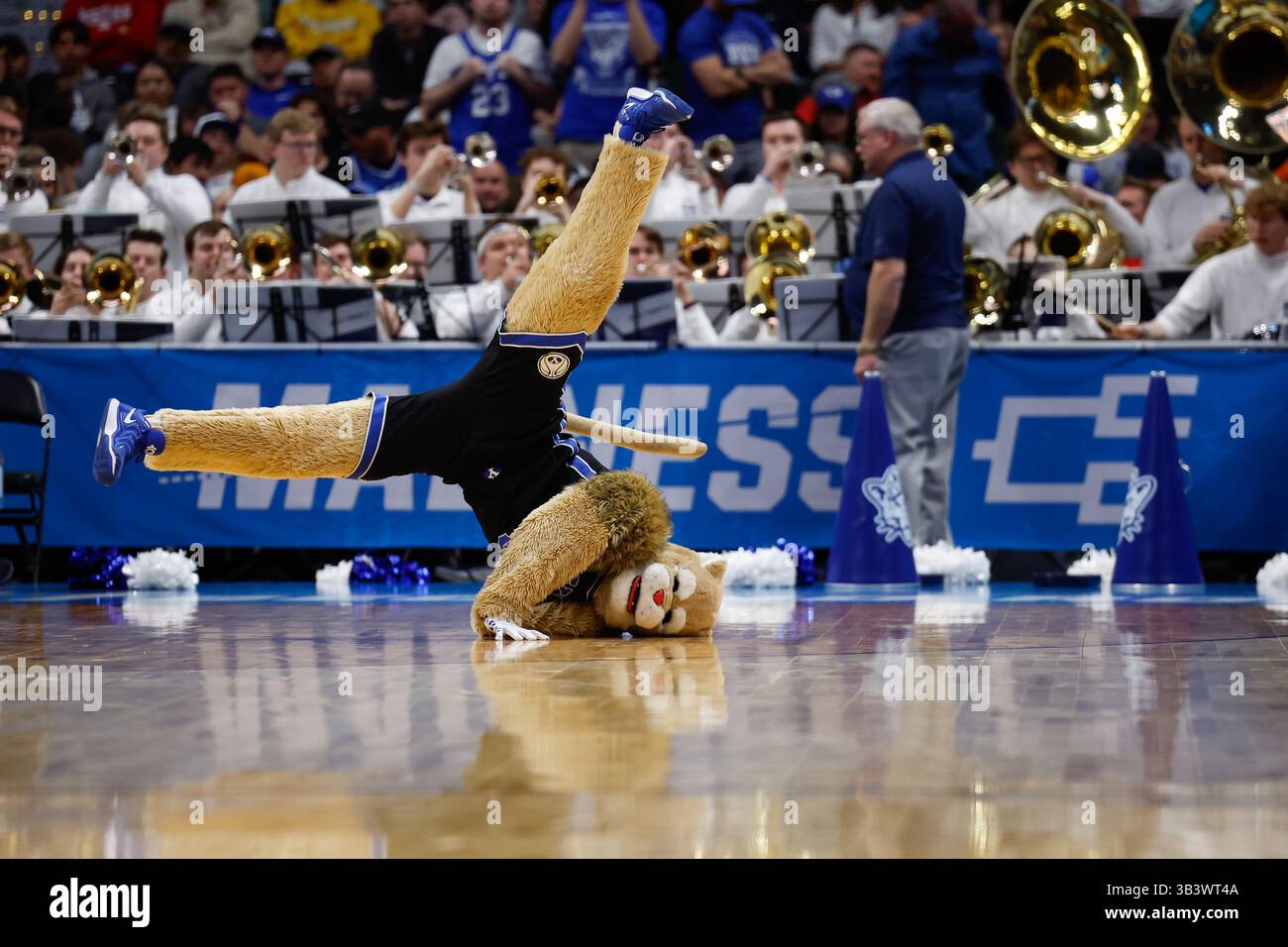 Denver, CO, USA. 22nd Mar, 2025. Brigham Young Cougars mascot Cosmo ...