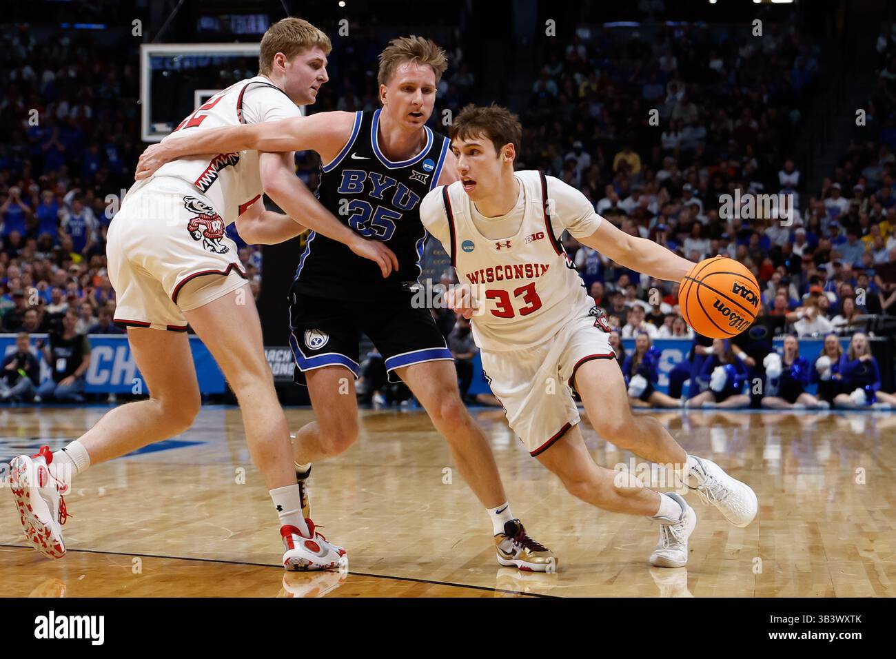 Denver, CO, USA. 22nd Mar, 2025. Wisconsin Badgers guard Jack Janicki ...
