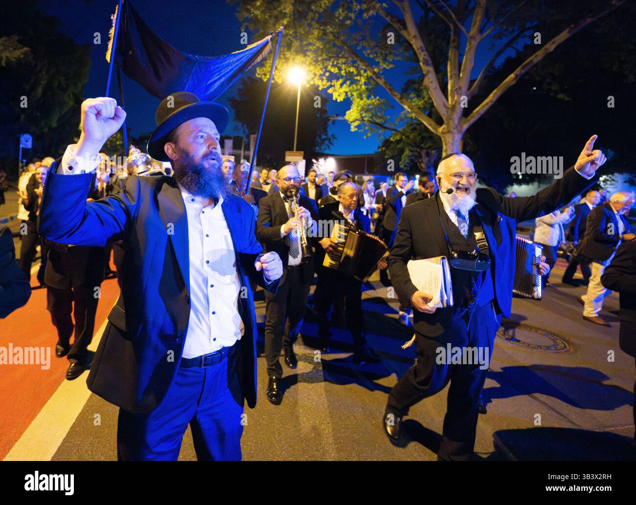 Hanau, Germany. 29th Apr, 2025. In a solemn procession, the new Torah ...