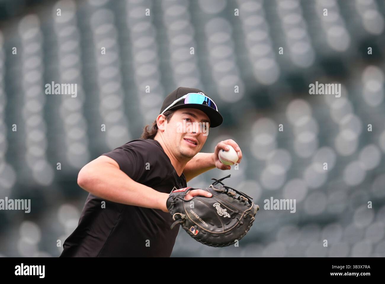 Colorado Rockies first baseman Michael Toglia (4) warms up before a ...