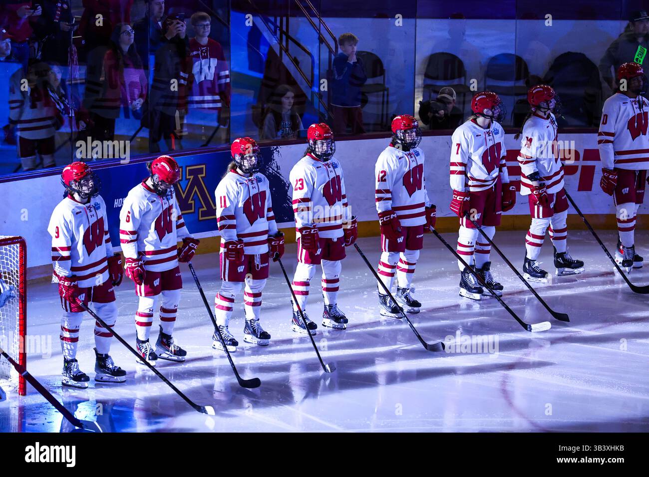 Minneapolis. 23rd Mar, 2025. Wisconsin Badgers players line up before ...