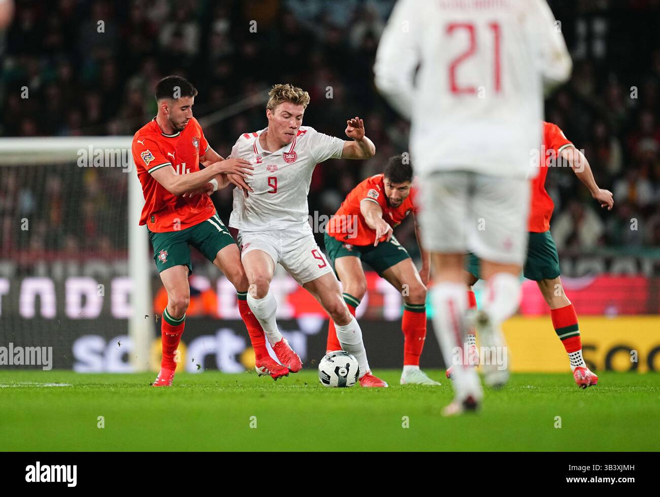 March 23 2025: Rasmus Hojlund of Denmark and Goncalo Inacio of Portugal ...