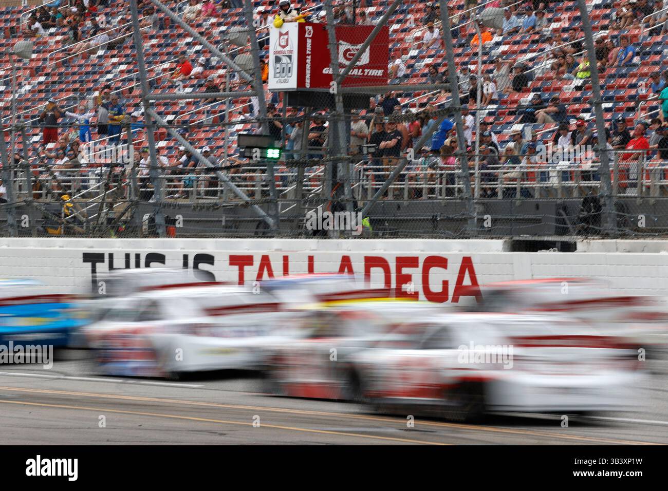 TALLADEGA, AL - APRIL 26: The field restarts past the start-finish line during the running of ...