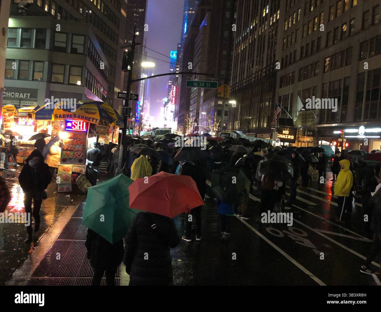 Manhattan Times Square with colorful lights, busy streets, tourists ...