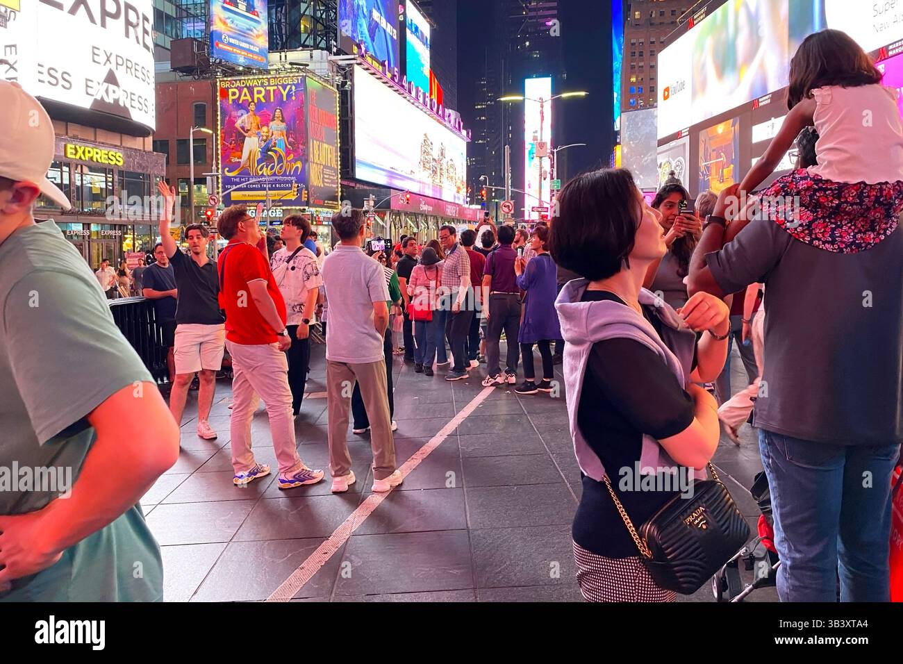 Times Square New York with electric lights, walking crowds, colorful ...