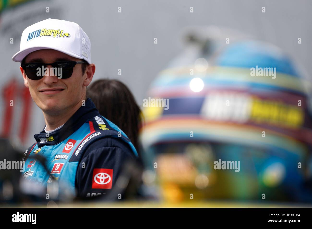 TALLADEGA, AL - APRIL 25: Lawless Alan (#20 AUTOParkit Toyota) talks ...