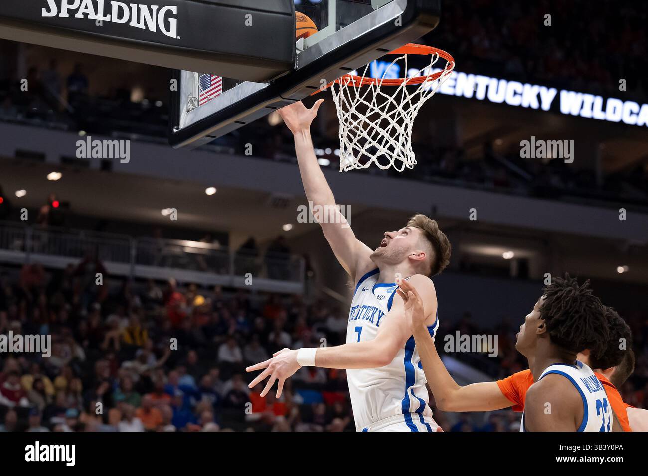 Milwaukee, WI, USA. 23rd Mar, 2025. Kentucky Wildcats forward Andrew Carr (7) shoots a layup ...