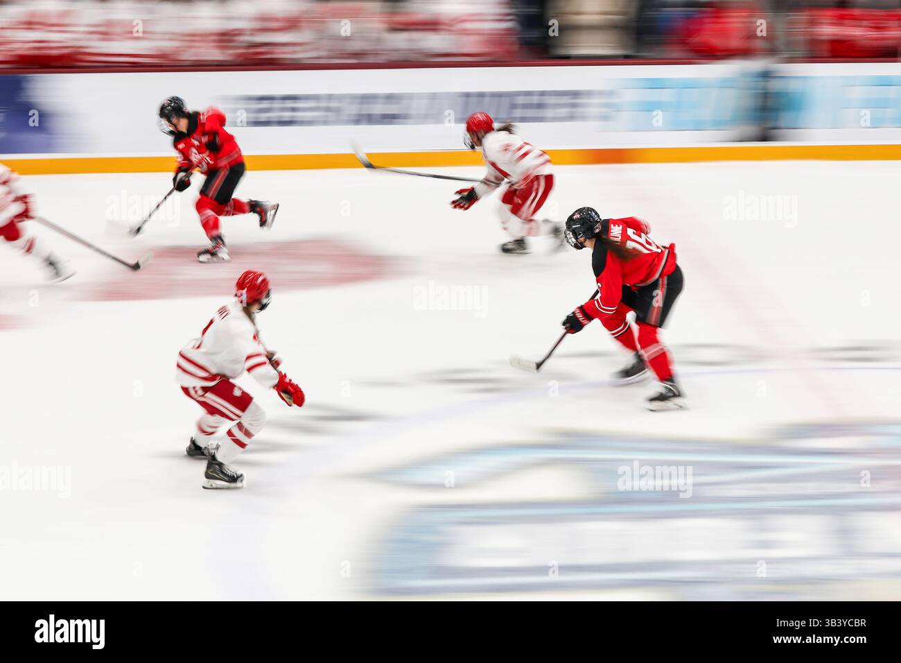 Minneapolis. 23rd Mar, 2025. Players skate on the ice during the NCAA ...