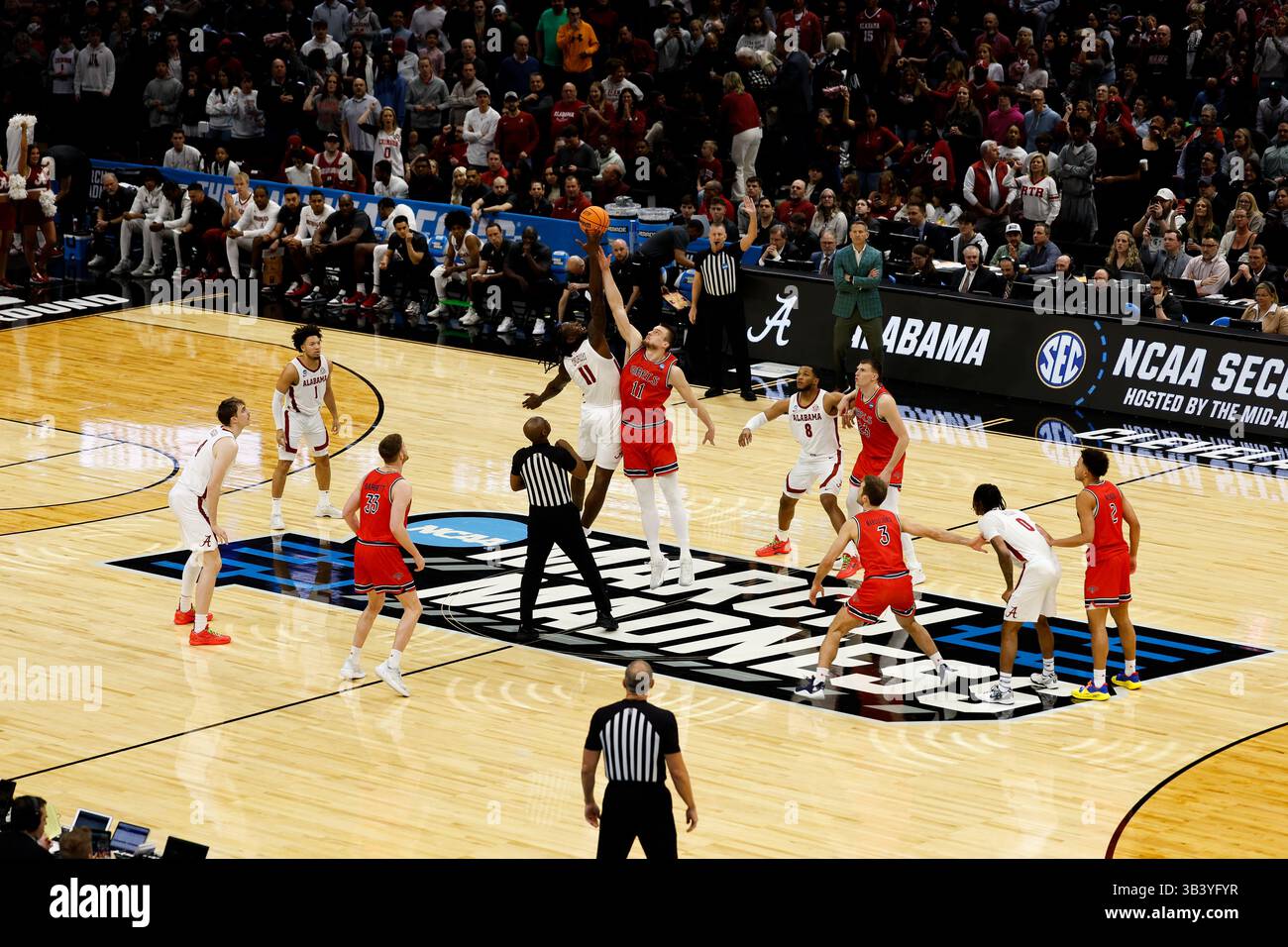 March 23, 2025: Alabama center Clifford Omoruyi (11) and St. Mary's center Mitchell Saxen (11 ...