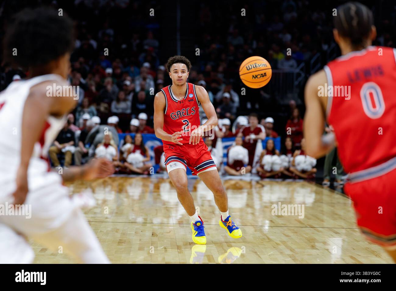 March 23, 2025: St. Mary's guard Jordan Ross (2) passes the ball to St. Mary's guard Mikey Lewis ...