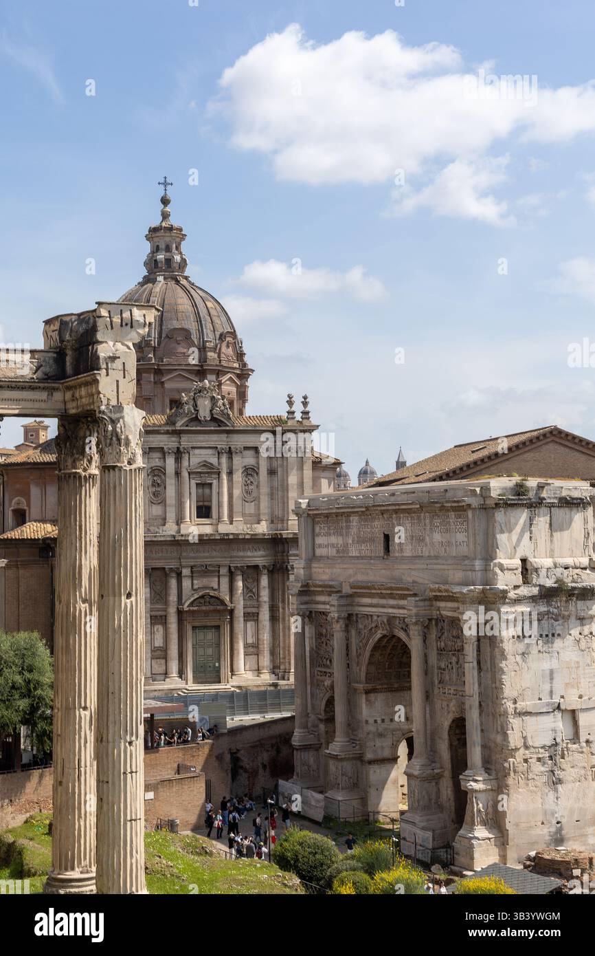 Visitors admire the grandeur of ancient columns and iconic structures ...