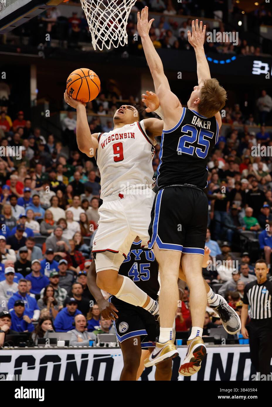 Denver, CO, USA. 22nd Mar, 2025. Wisconsin Badgers guard John Tonje (9 ...