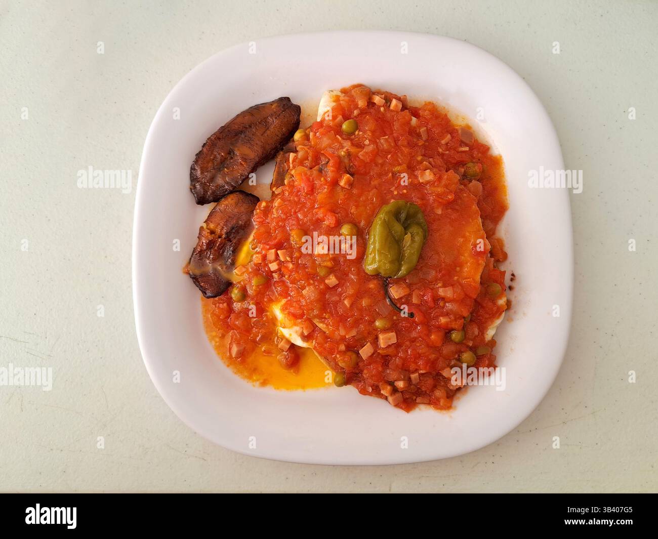Huevos motulenos are a typical breakfast dish from the town of Motul in ...