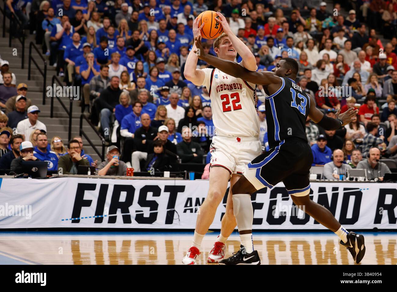 Denver, CO, USA. 22nd Mar, 2025. Wisconsin Badgers forward Steven Crowl ...