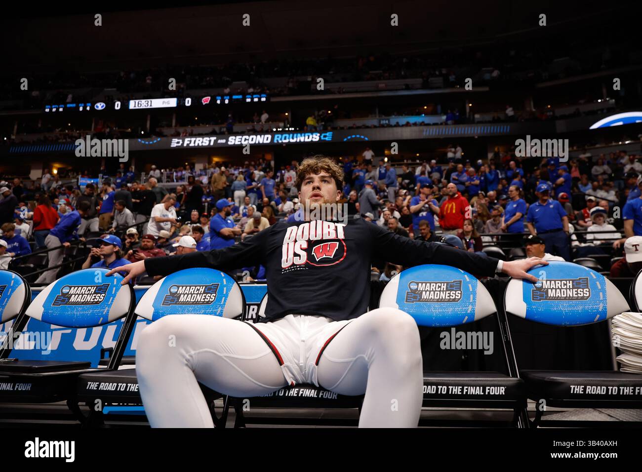 Denver, CO, USA. 22nd Mar, 2025. Wisconsin Badgers guard Max Klesmit ...