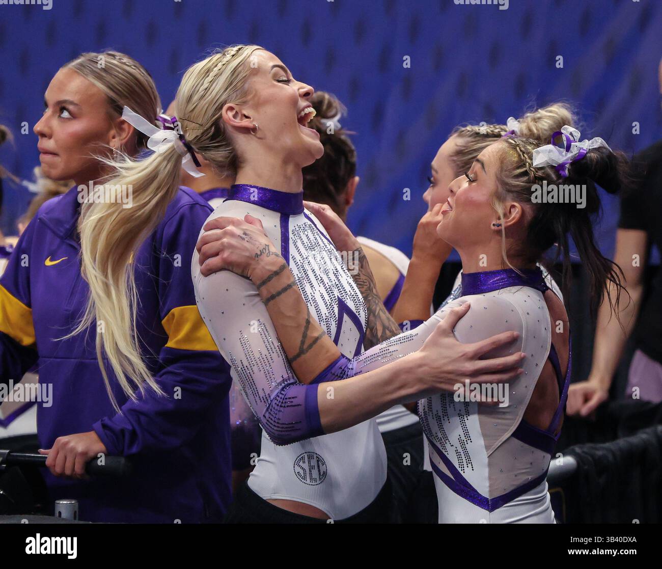 March 22, 2025: LSU's Olivia Dunne and KJ Johnson celebrate following ...