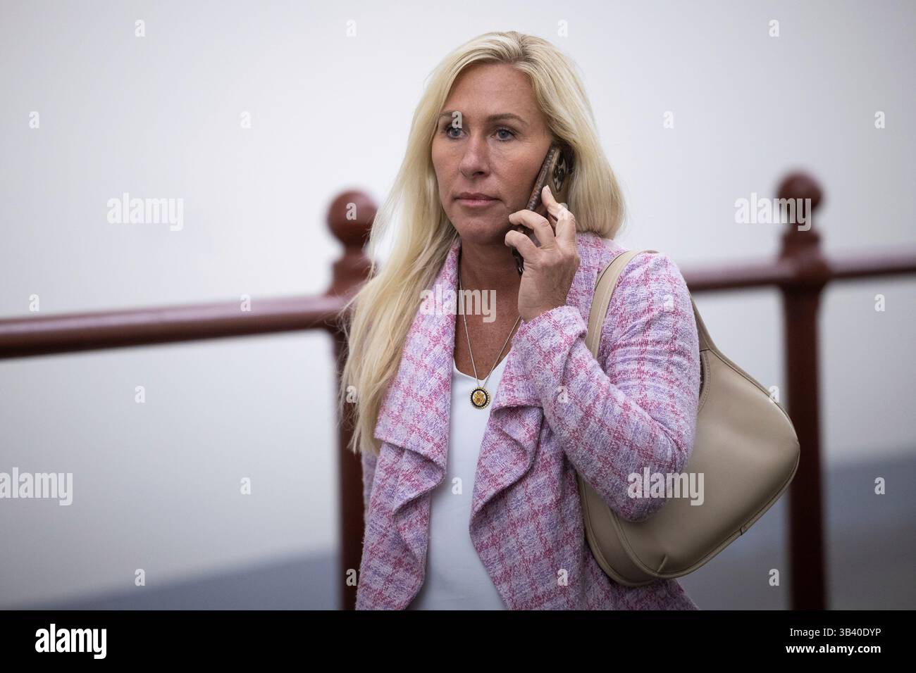 Rep. Marjorie Taylor Greene (R-Ga.) walks to a vote at the U.S. Capitol ...