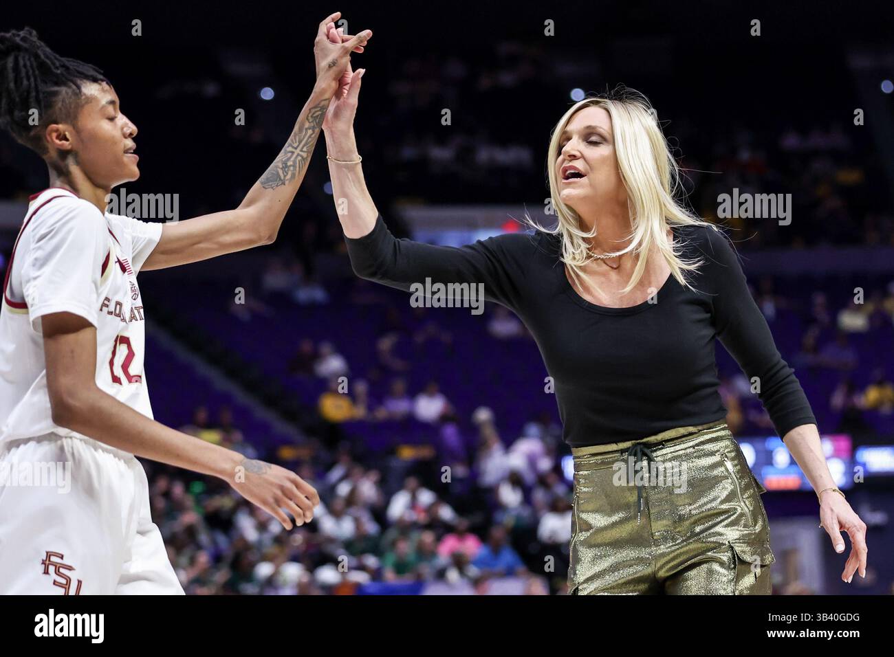 March 22, 2025: Florida St. Head Coach Brooke Wyckoff encourages her ...