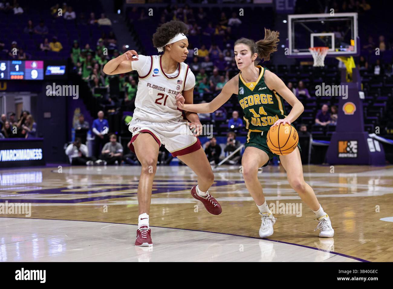 March 22, 2025: George Mason's Paula Suarez (14) dribbles the ball past ...