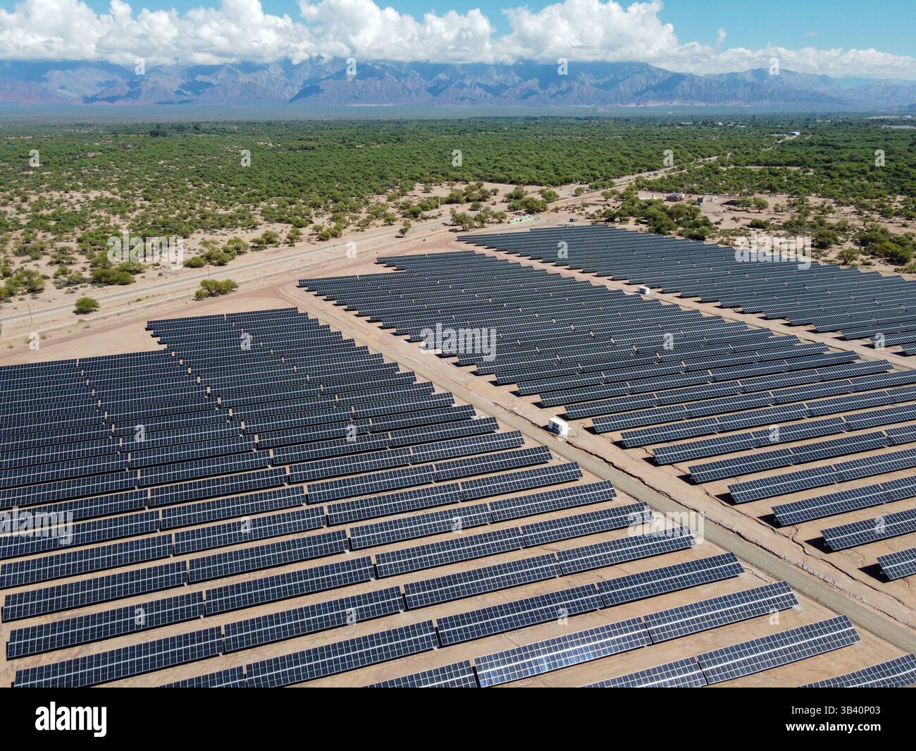 The dawn light illuminates the extensive solar panel fields in ...
