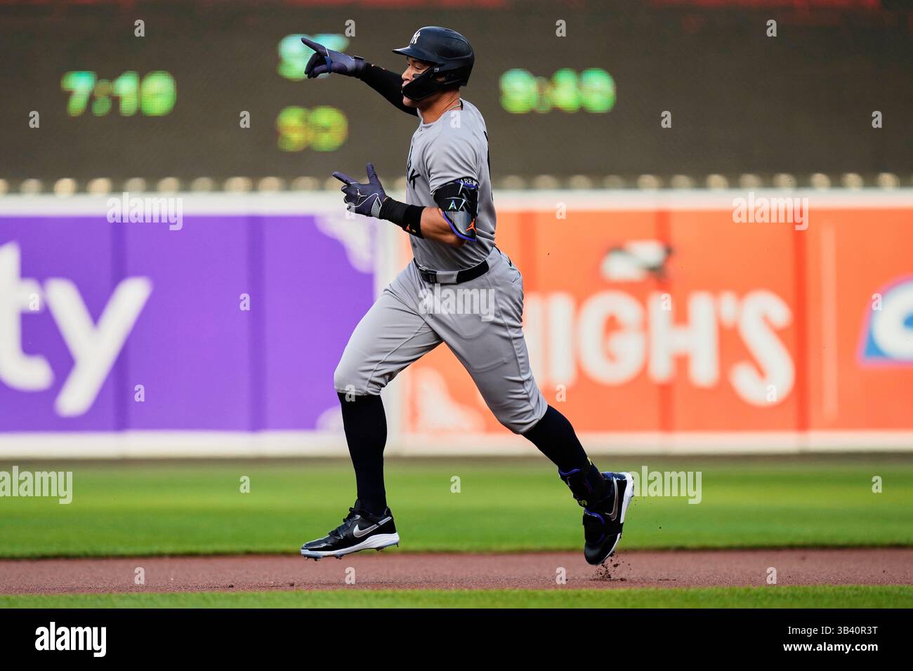 New York Yankees' Aaron Judge rounds the bases after hitting a home run ...
