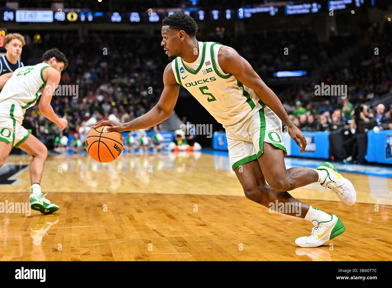 Seattle, WA, USA. 21st Mar, 2025. Oregon Ducks guard TJ Bamba (5 ...