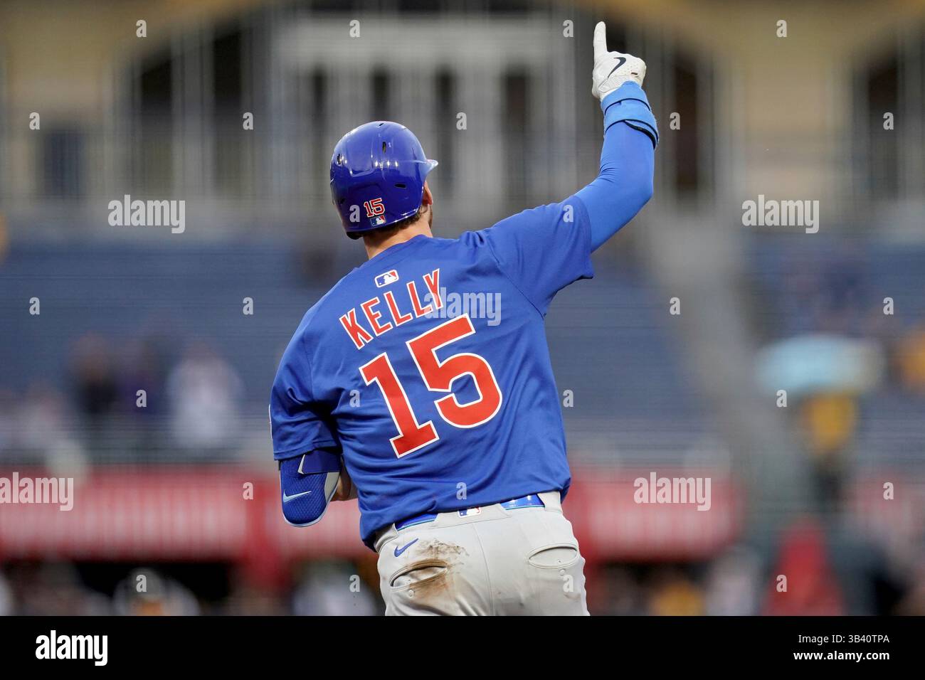 Chicago Cubs' Carson Kelly rounds the bases after hitting a two-run ...