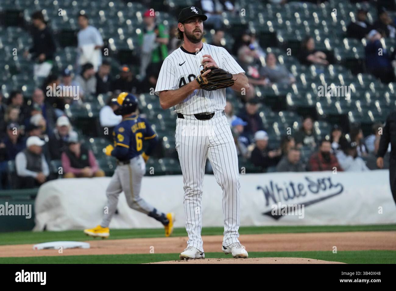 Chicago White Sox starting pitcher Tyler Gilbert looks at first baseman ...
