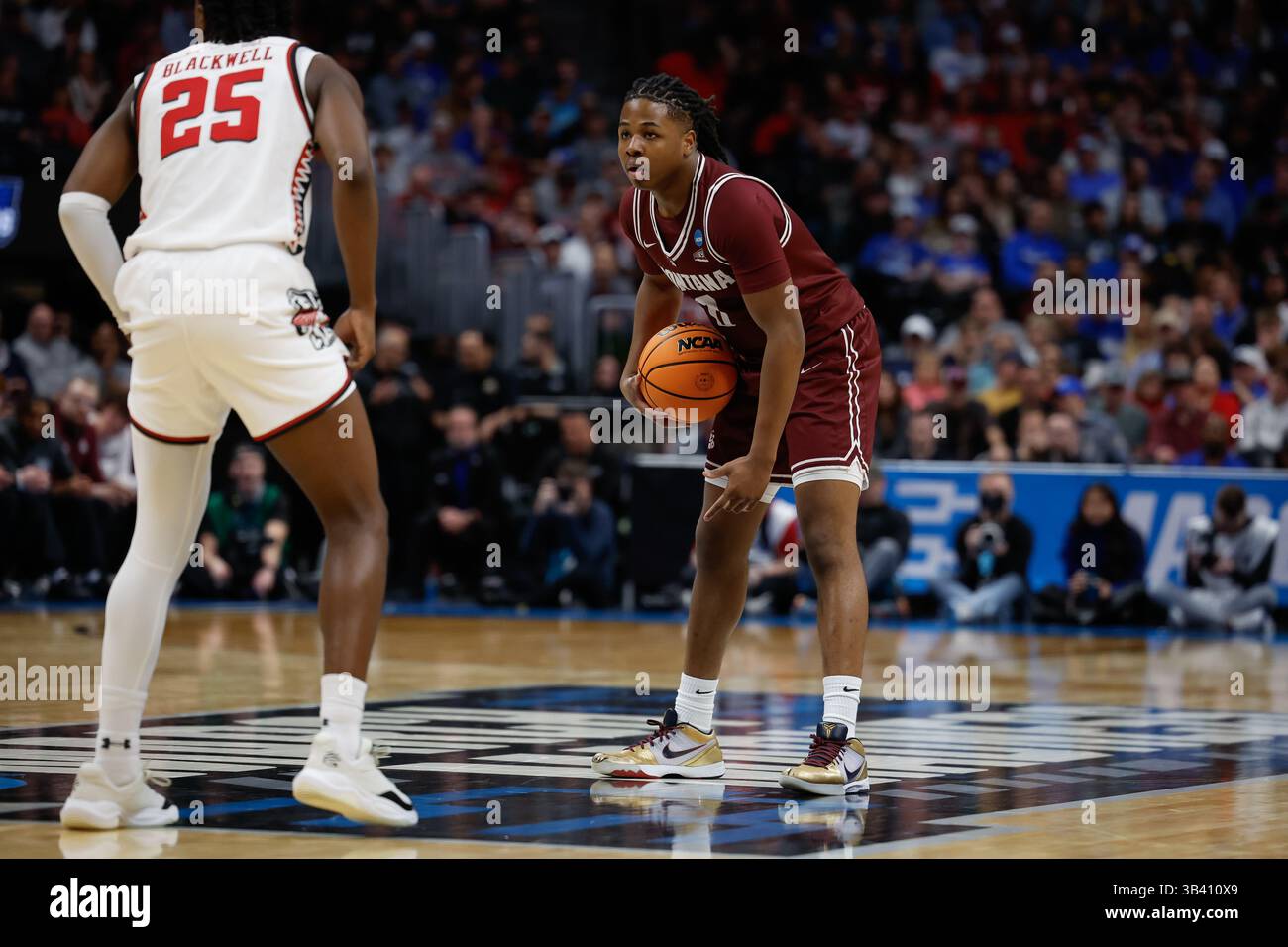 Denver, CO, USA. 20th Mar, 2025. Montana Grizzlies guard Money Williams ...