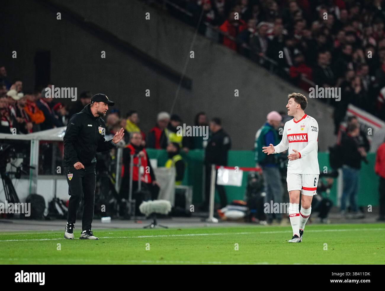 April 02 2025: Sebastian Hoeneß of VfB Stuttgart and Angelo Stiller of ...