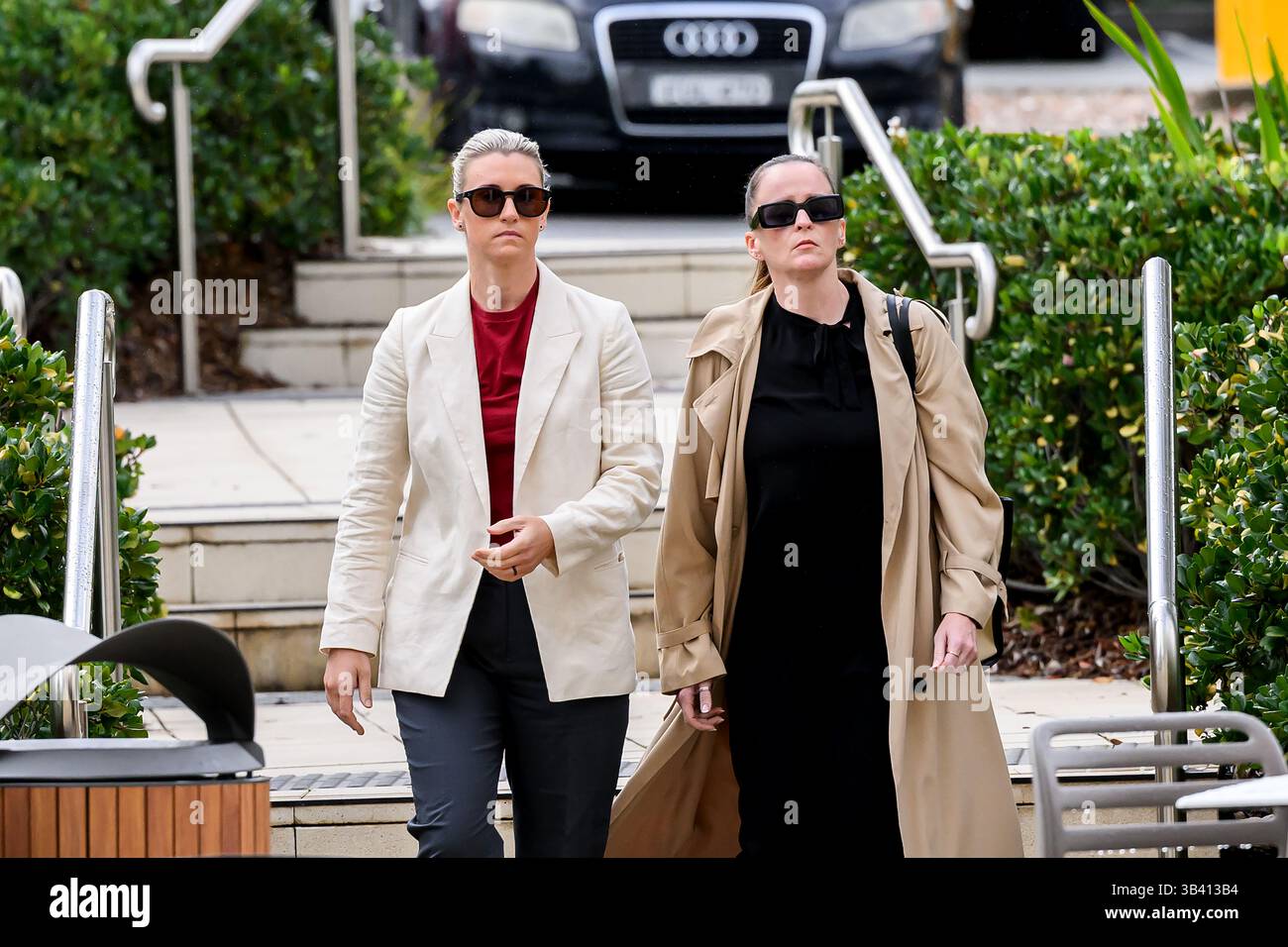 NSW Police Inspector Amy Scott (left) arrives at the Lidcombe Coroners ...