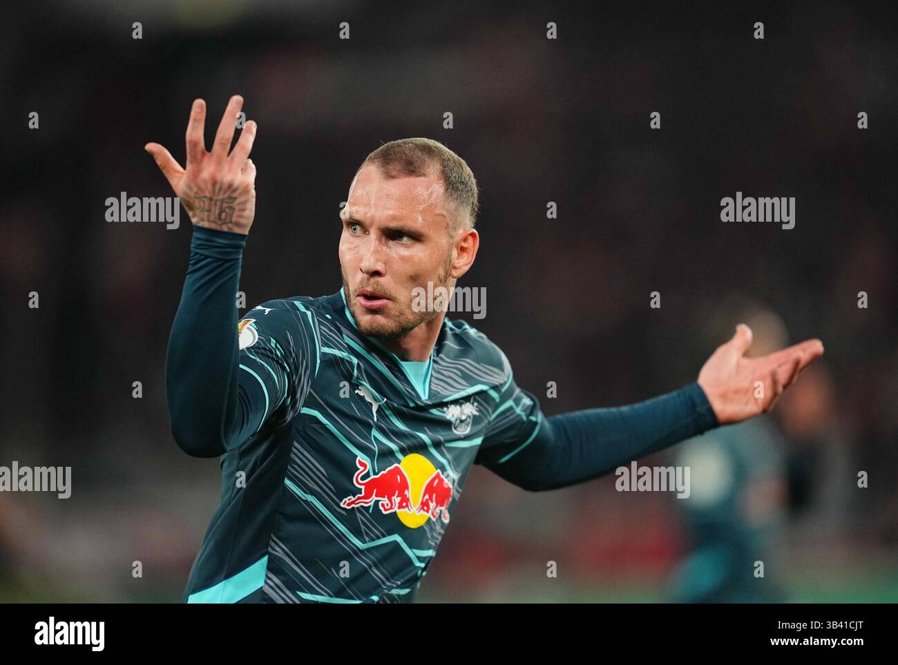 MHP Arena, Stuttgart, Germany. 02nd Apr, 2025. David Raum of RB Leipzig gestures during a DFB ...