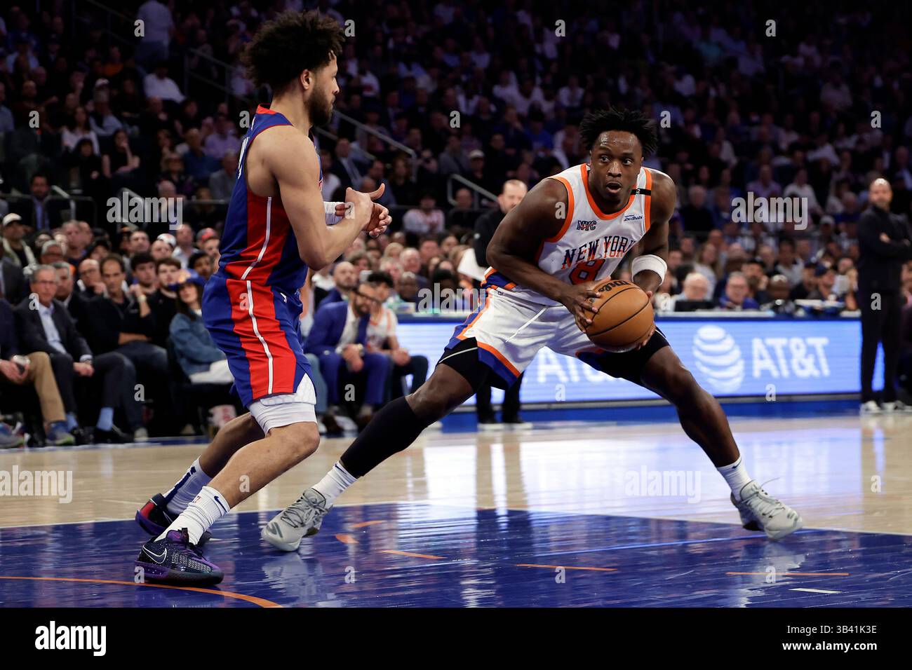New York Knicks forward OG Anunoby (8) drives to the basket past Detroit Pistons guard Cade ...