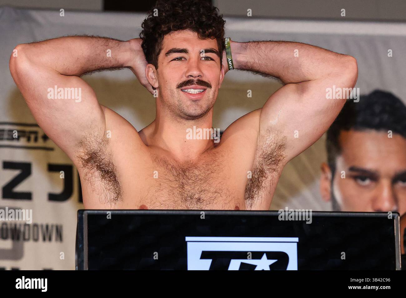 Heavyweight Richard Torrez Jr. 4th Apr, 2025. posses on stage during ...