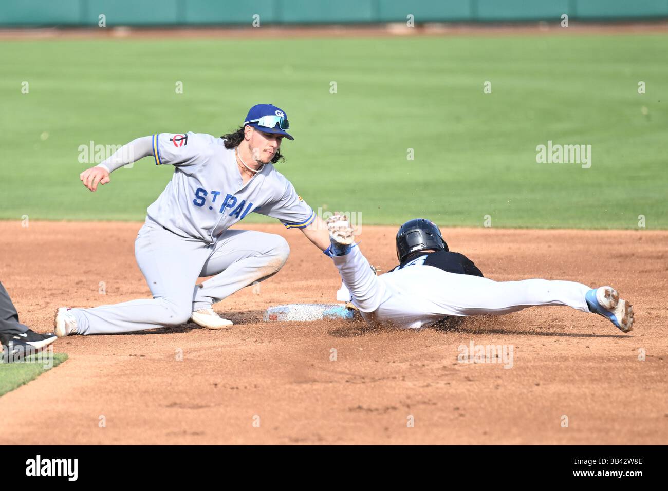 April 29, 2025: St. Paul Saints infielder Ryan Fitzgerald (1) tags out Columbus Clippers ...