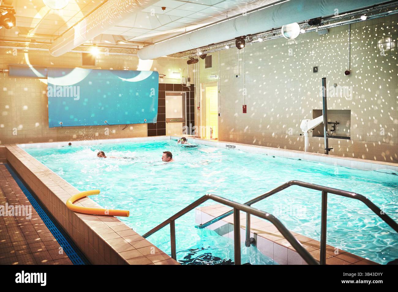 Luxury people in spa indoor swimming pool in hotel on vacation, travel ...
